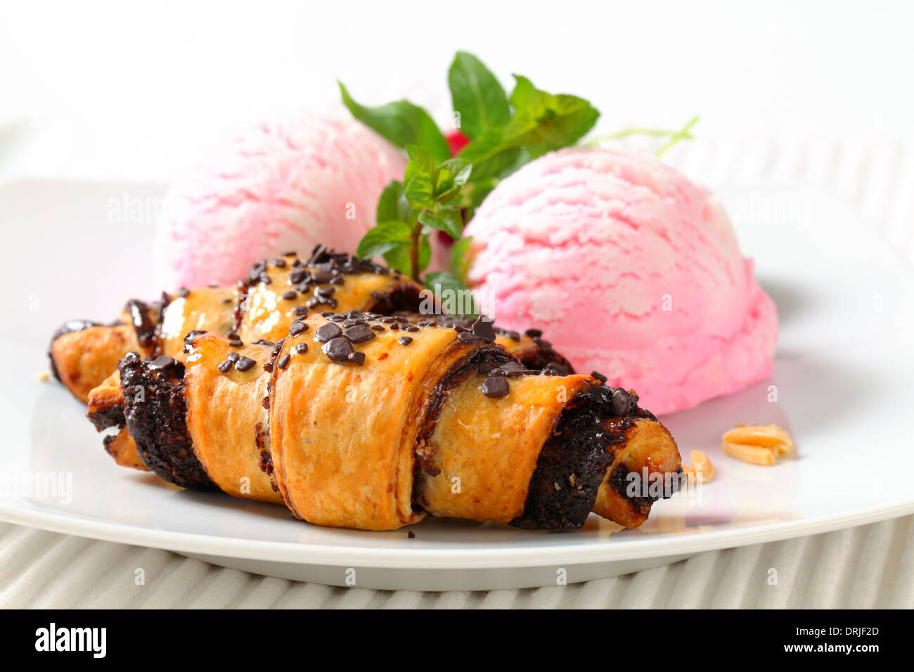 Chocolate chip crescent rolls with two scoops of ice cream Stock Photo ...