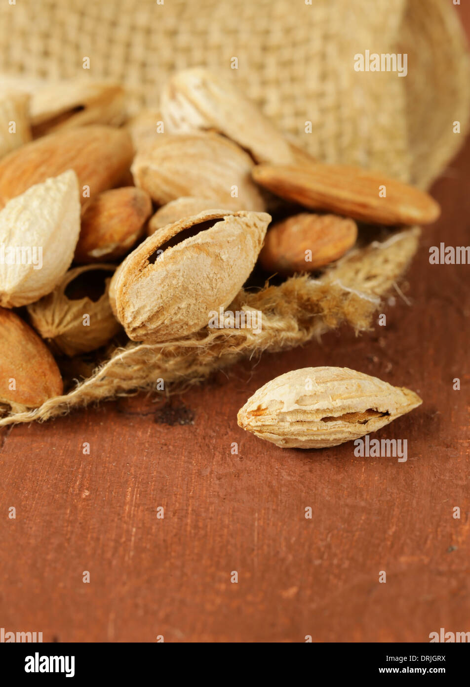 pile of peeled and inshell almonds - delicious and healthy nuts Stock ...