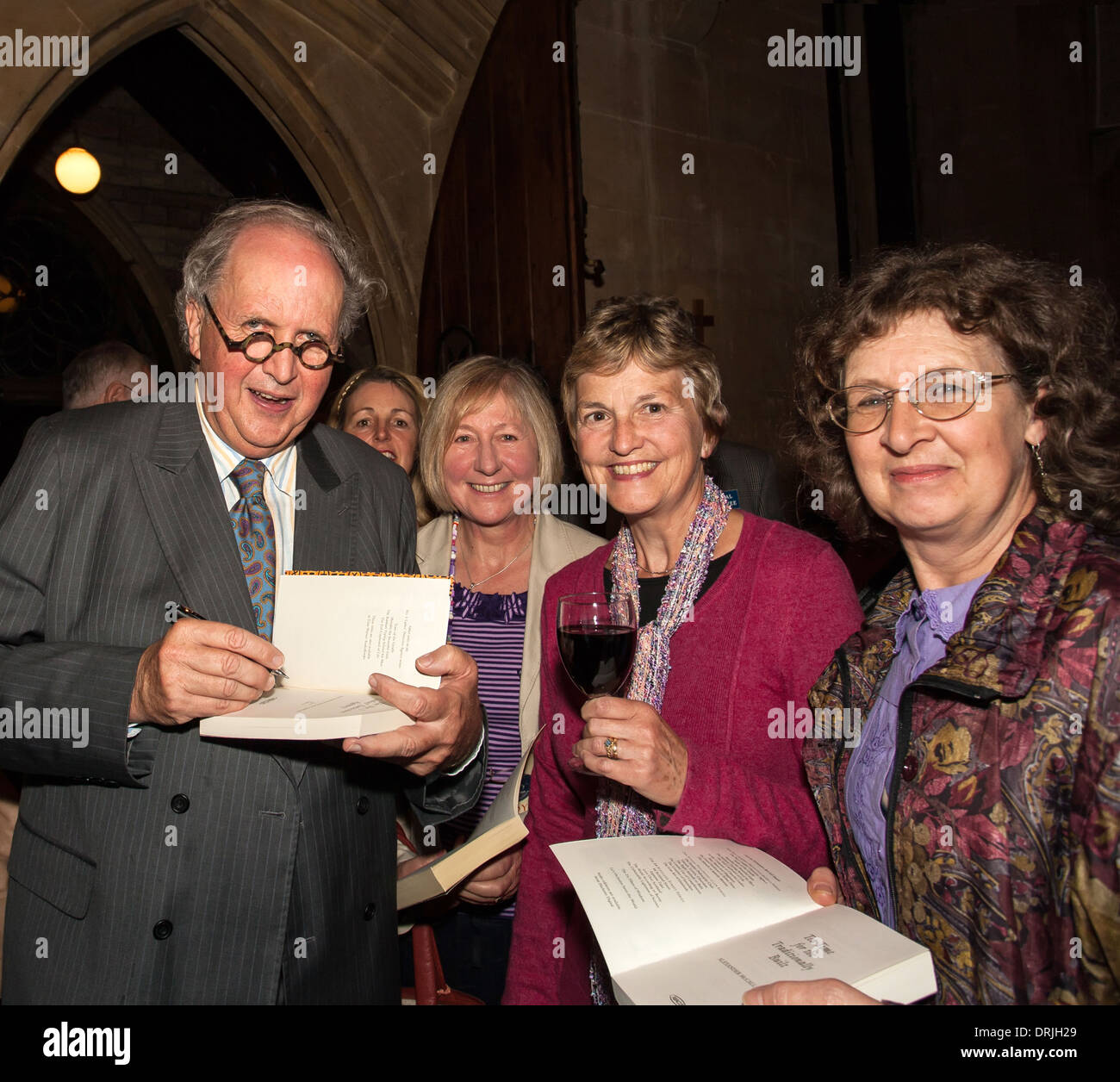 Author Alexander McCall Smith with fans at a book signing Stock Photo ...