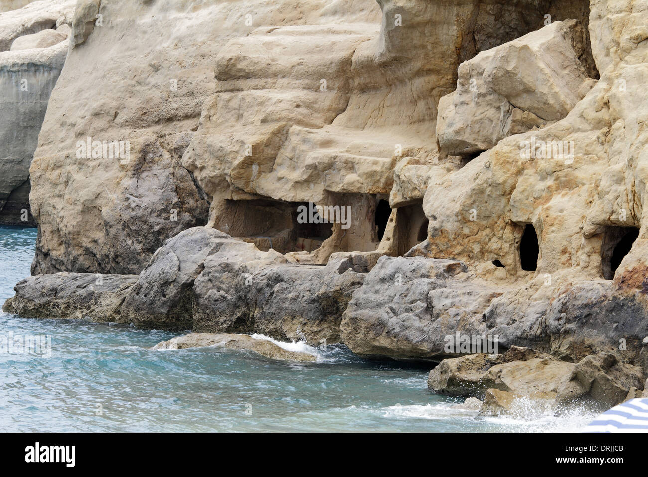 Matala caves on a Greek island of Crete Stock Photo - Alamy