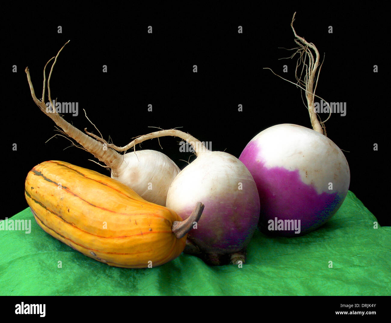 Turnips with squash on green table cover, Vermont, USA Stock Photo - Alamy