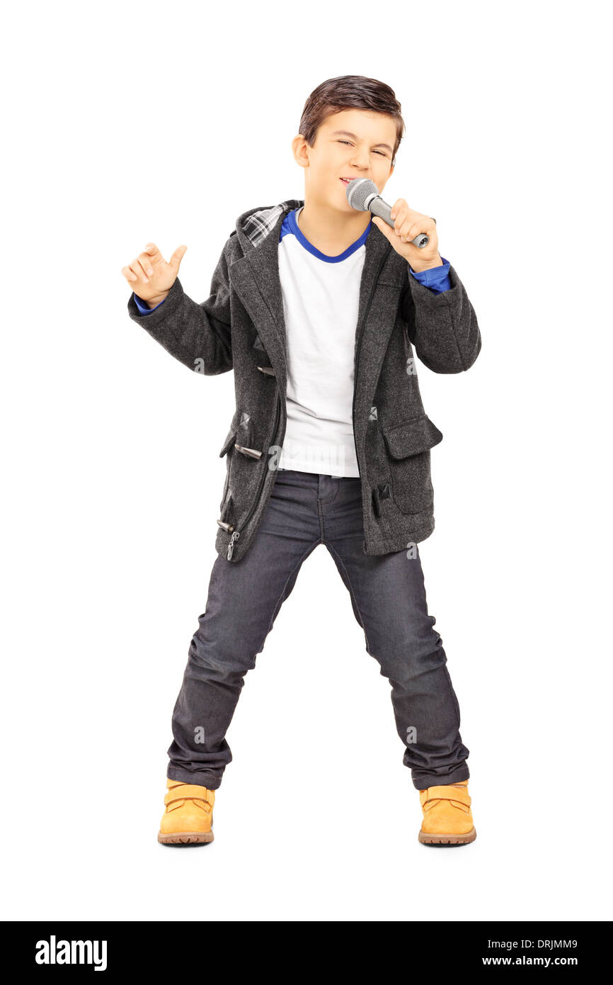 Full length portrait of a boy singing on microphone Stock Photo - Alamy