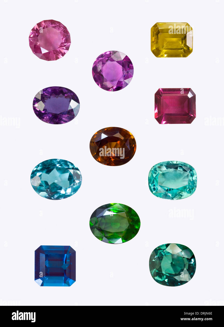 Tourmaline gemstones on white background Stock Photo - Alamy