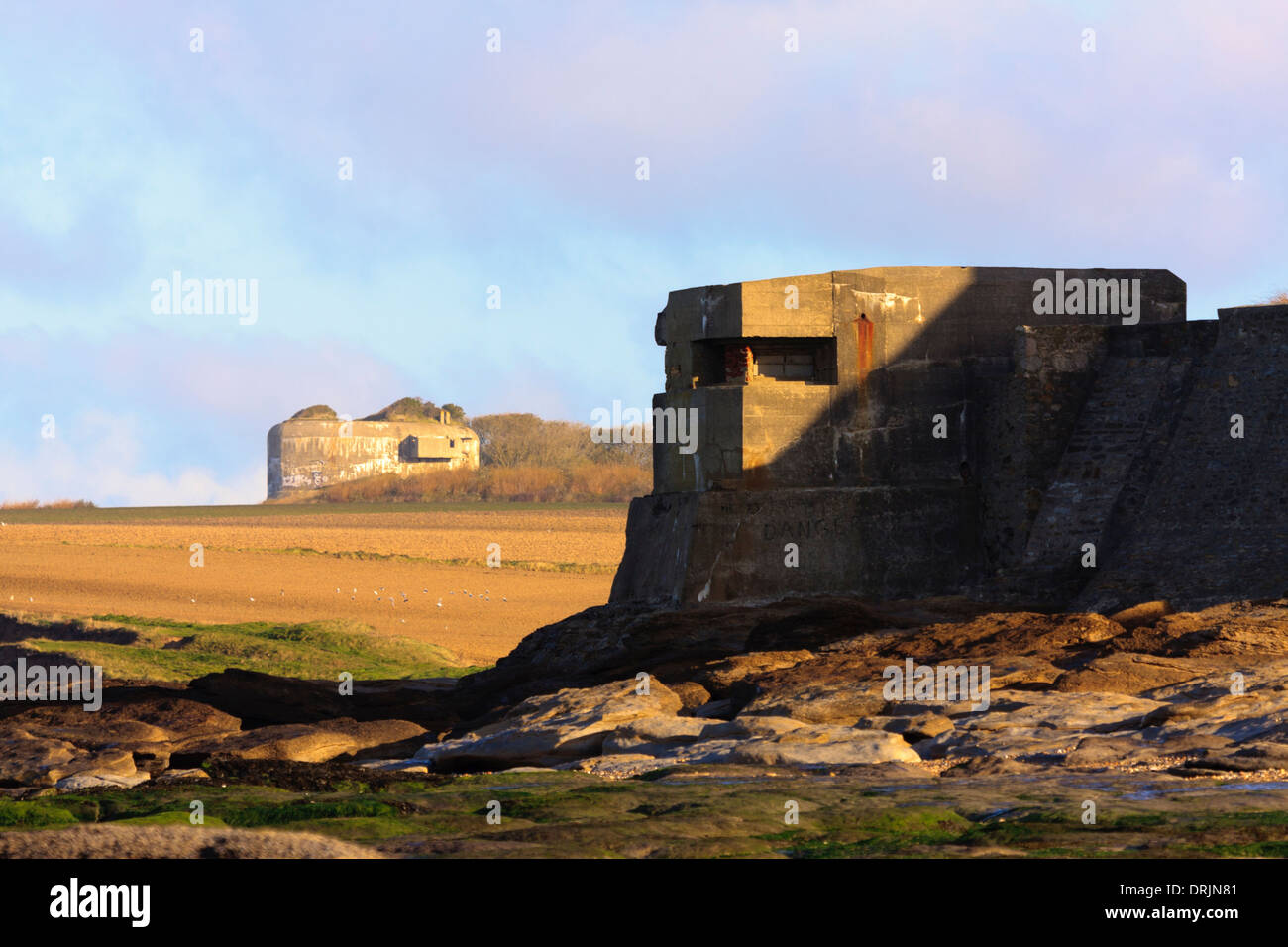 German gun emplacements on Normandy Coast. World War II bunkers ...
