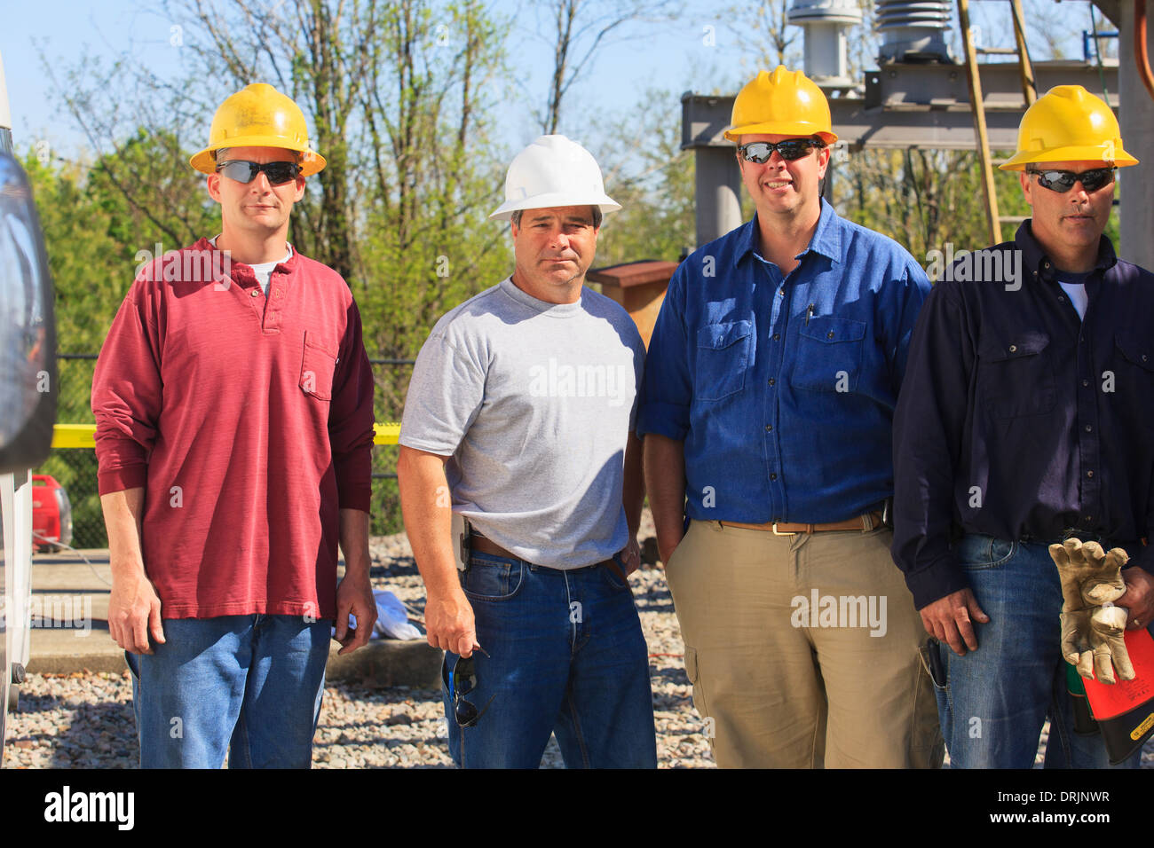 Power engineers at high voltage power distribution station, Braintree ...