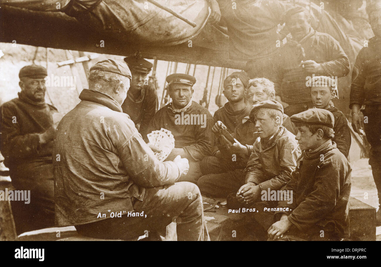 Sailors playing a came of cards Stock Photo - Alamy