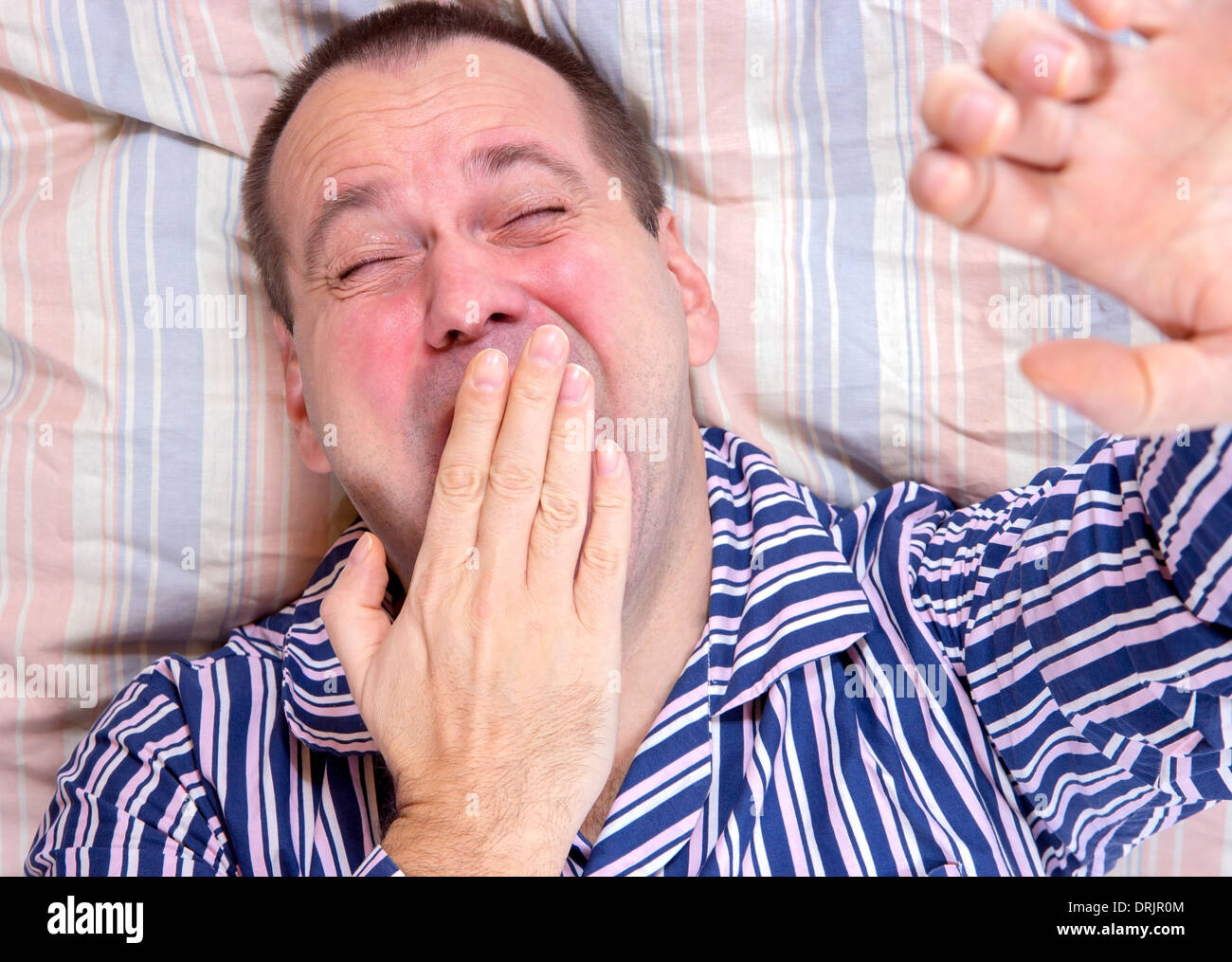 Man pyjamas yawn portrait men hi-res stock photography and images - Alamy