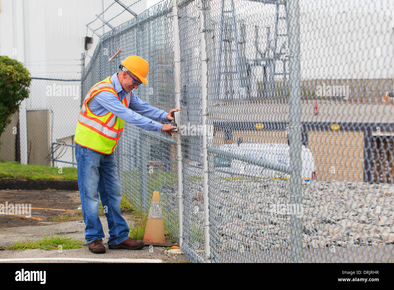 Electrical engineer using security system to enter electrical power ...