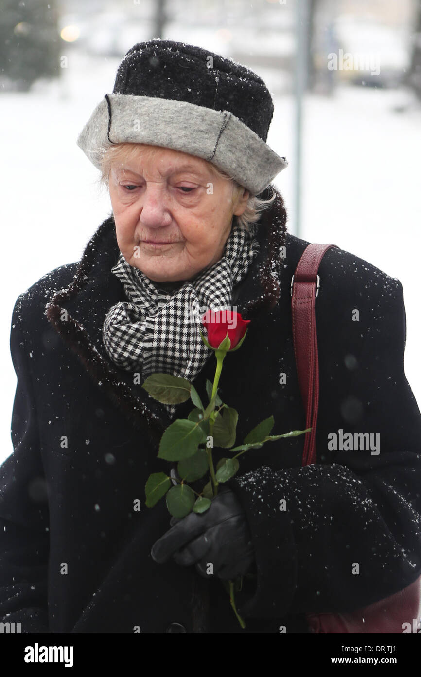 Berlin, Germany. 27th Jan, 2014. A survivor of Nazi's holocaust holds a ...