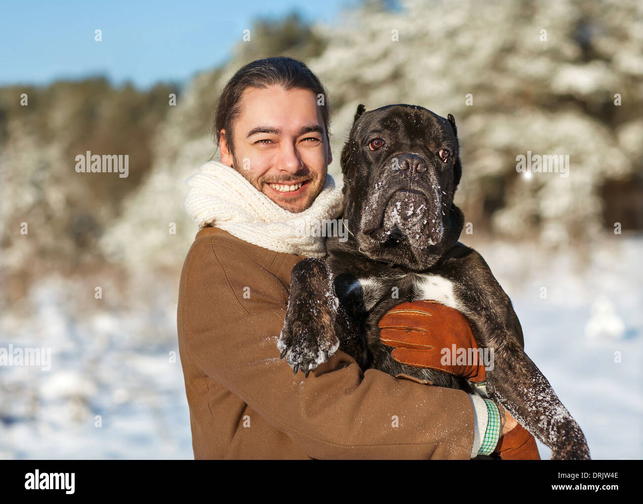 Man and dog friendship forever Stock Photo - Alamy