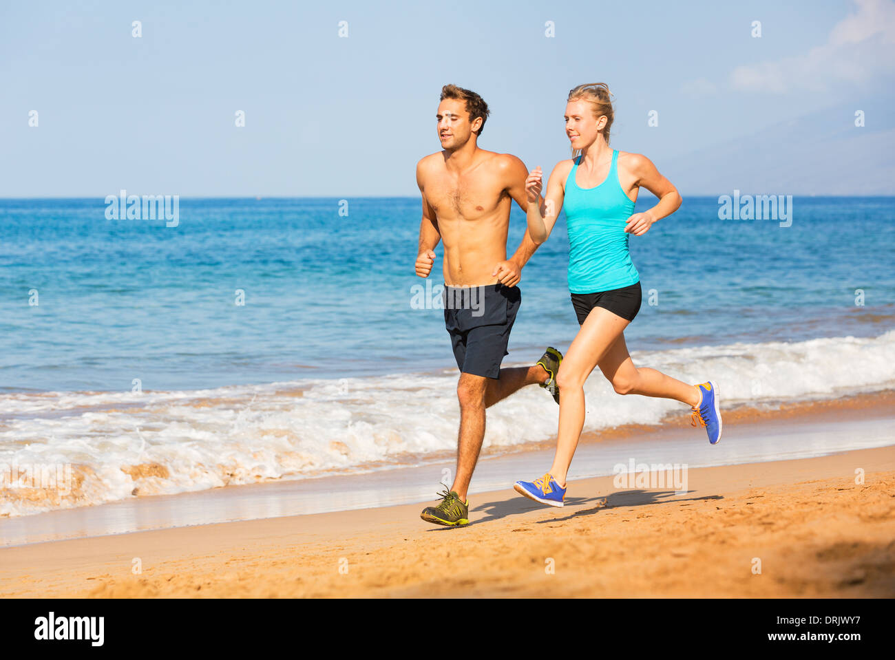 Men exercise on beach hi-res stock photography and images - Alamy