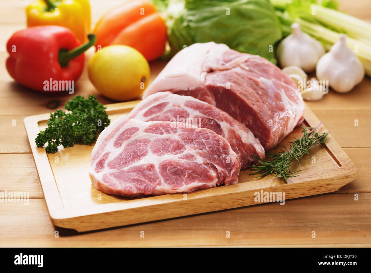 Raw pork meat and vegetables Stock Photo - Alamy