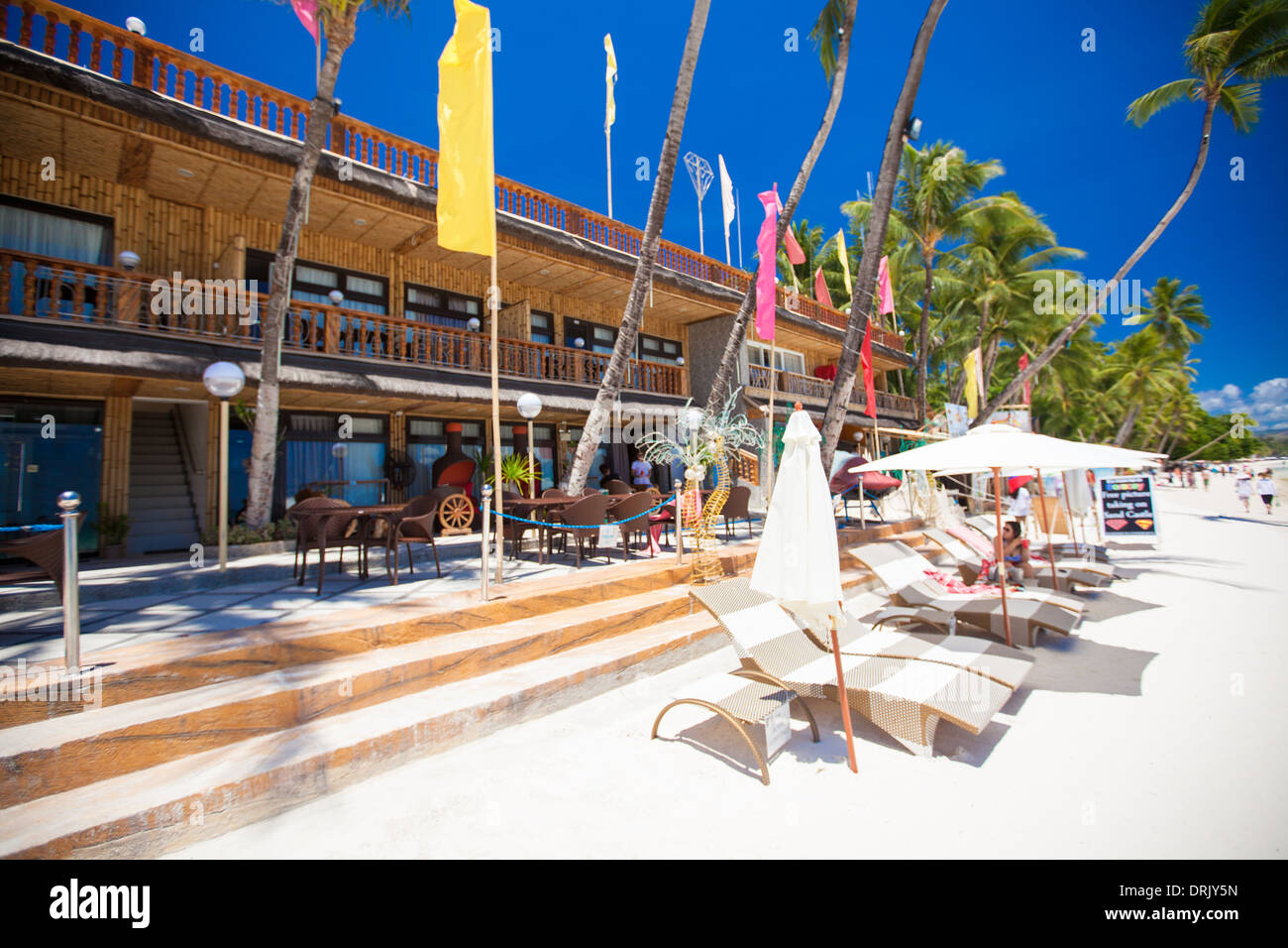 Outdoor restaurant tables on perfect white sand tropical beach Stock ...