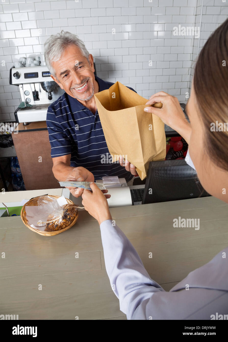Man cash register hi-res stock photography and images - Alamy