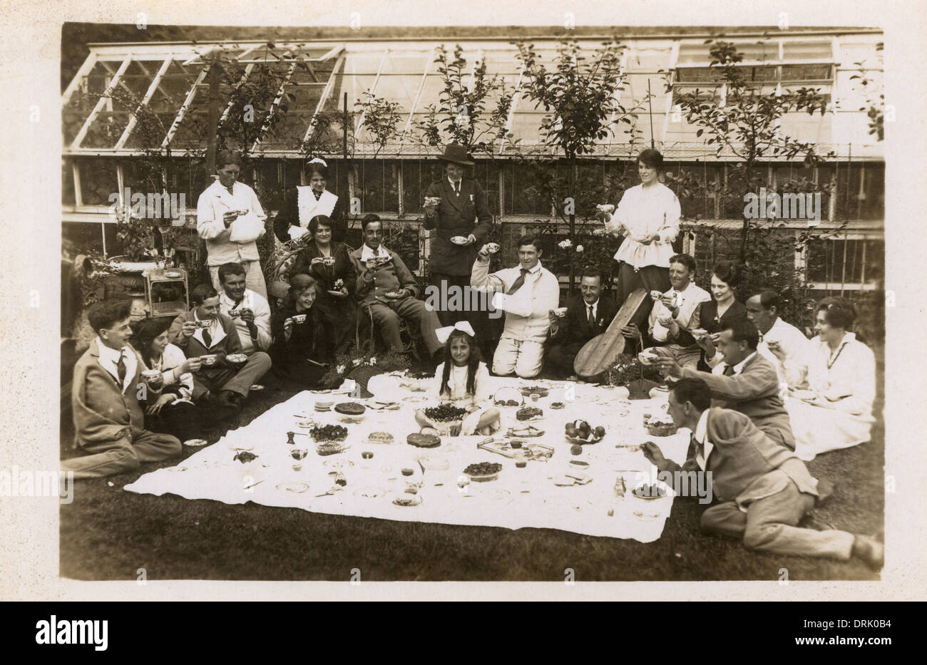 WWI - Girl gives a party to wounded soldiers Stock Photo - Alamy