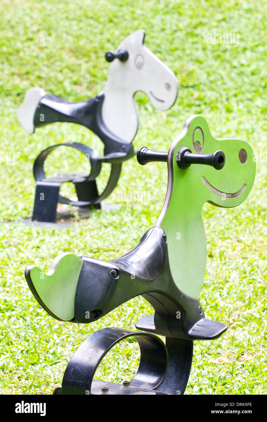 Rocking horse in playground hi-res stock photography and images - Alamy
