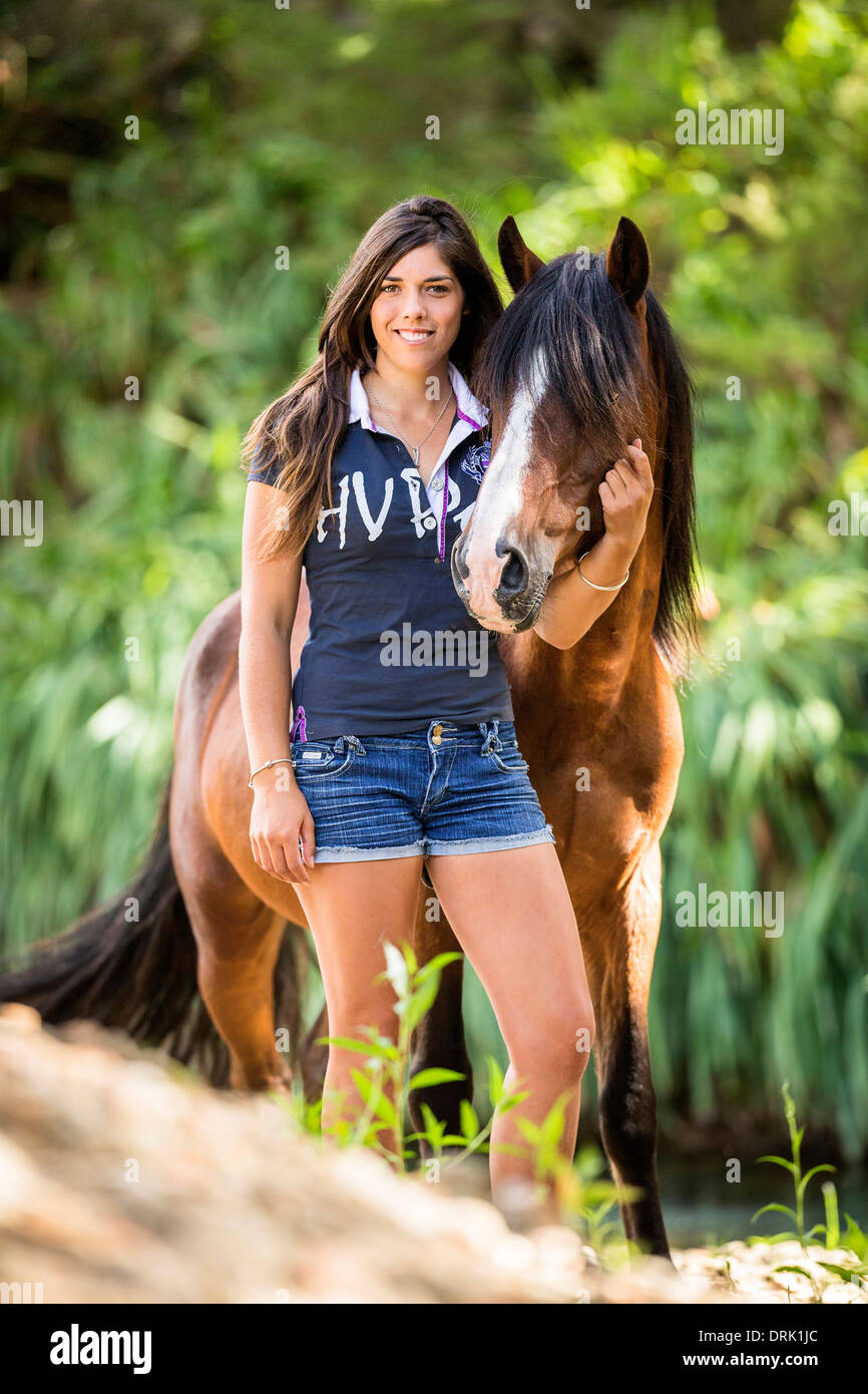 Kaimanawa Horse. Kelly Wilson with a bay gelding. New Zealand Stock ...
