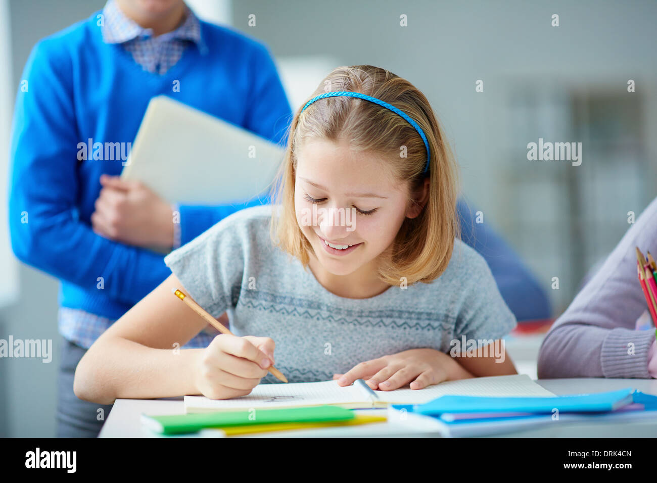 Portrait of diligent pupil drawing at lesson Stock Photo - Alamy