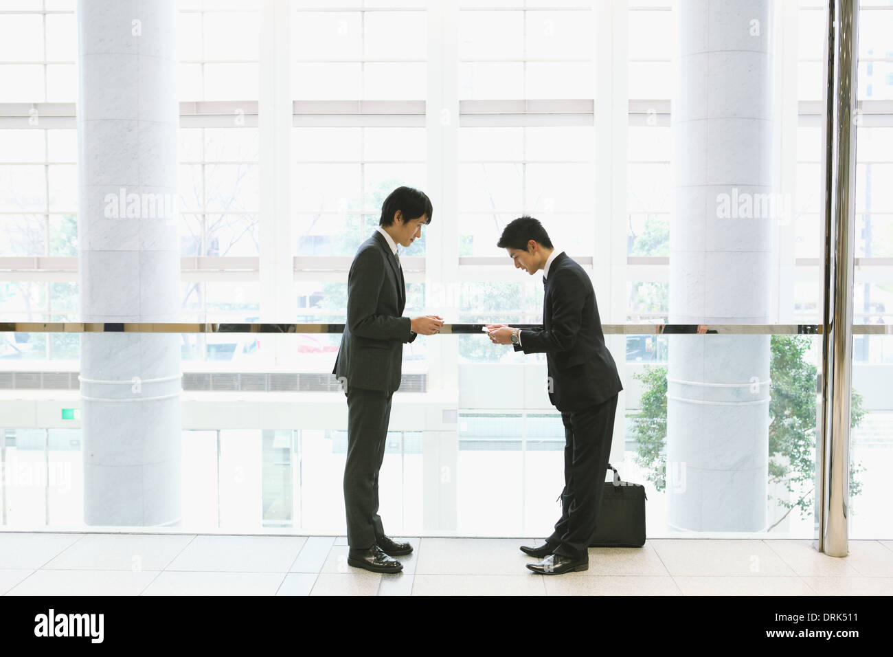 Business card exchange bow hi-res stock photography and images - Alamy