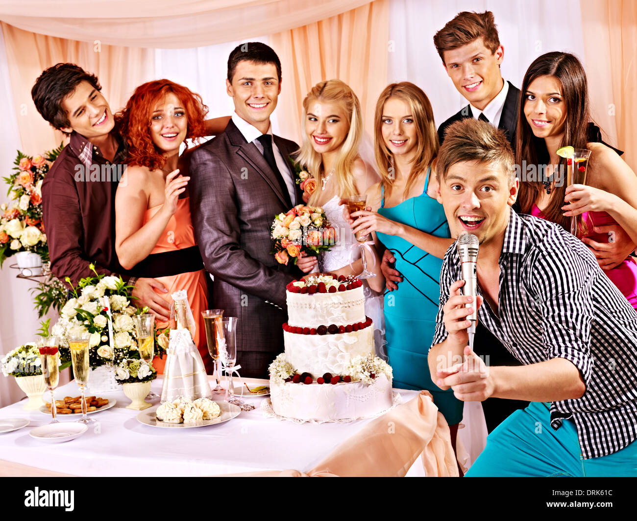 Wedding couple and guests sing song Stock Photo - Alamy