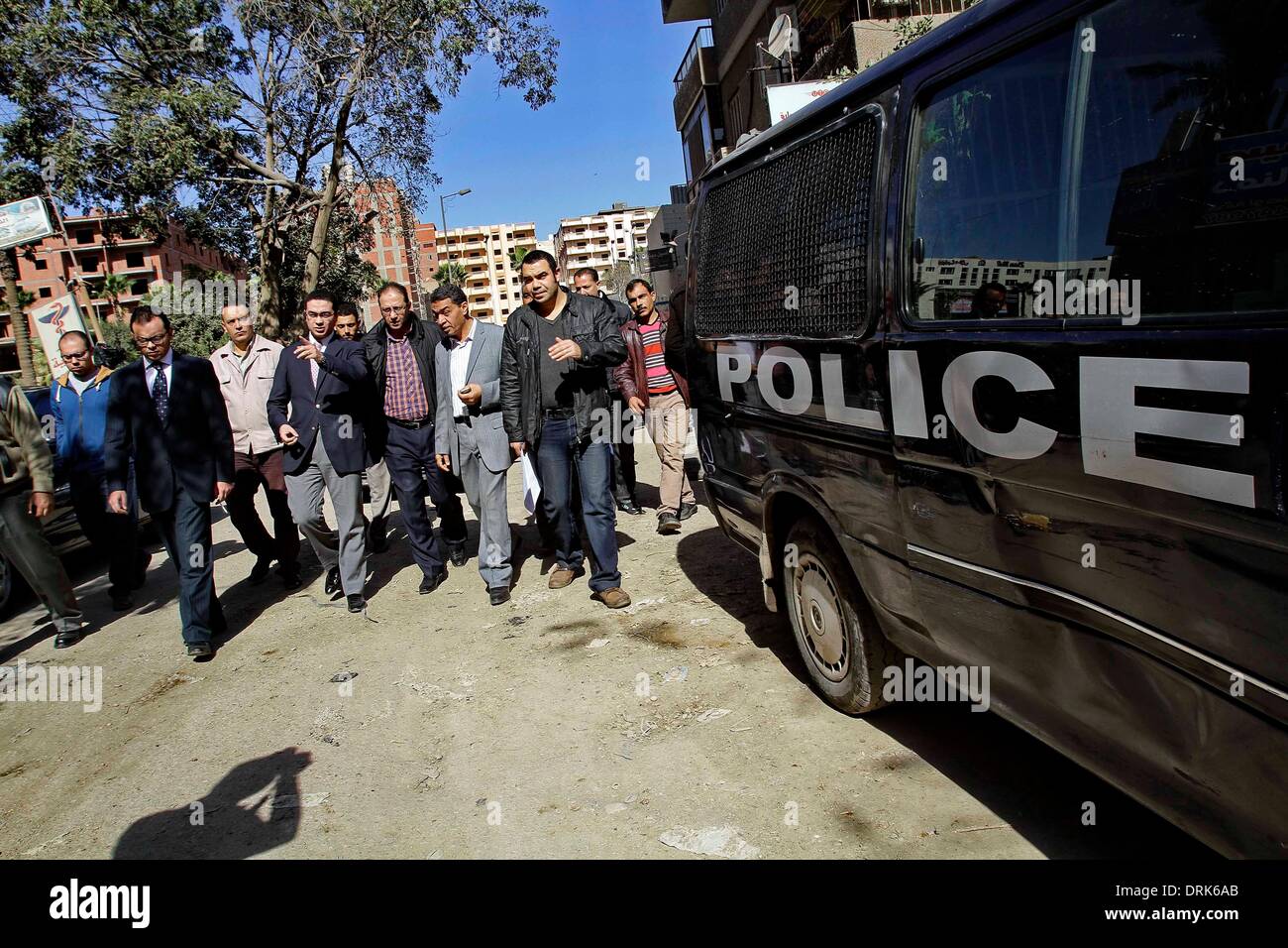 Cairo, Egypt. 28th Jan, 2014. Investigators work at the crime scene in ...