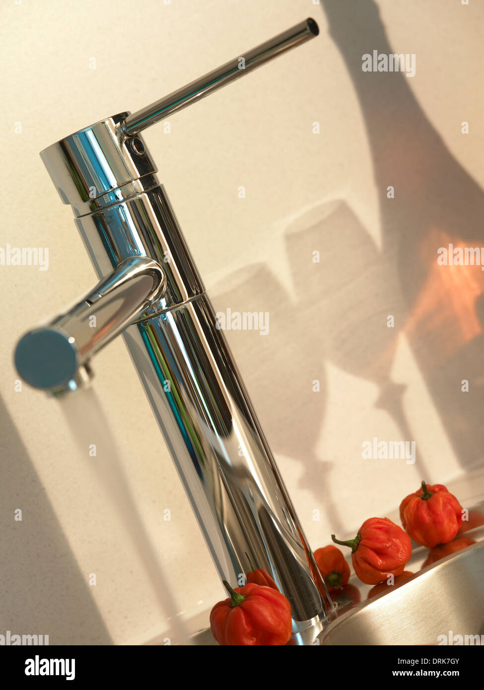 Food preparation at the kitchen sink Stock Photo - Alamy