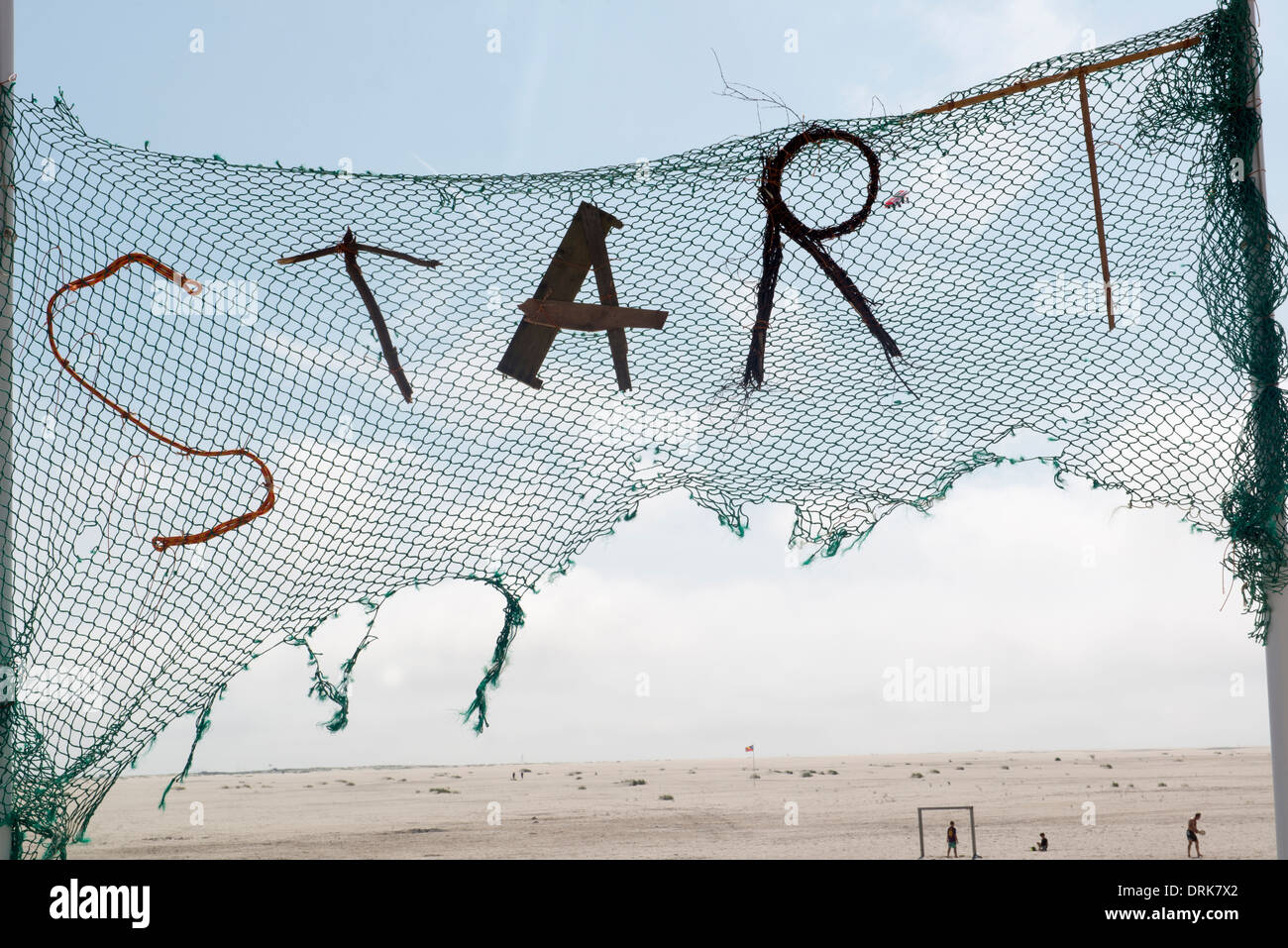 Torn net with start inscription hi-res stock photography and images - Alamy