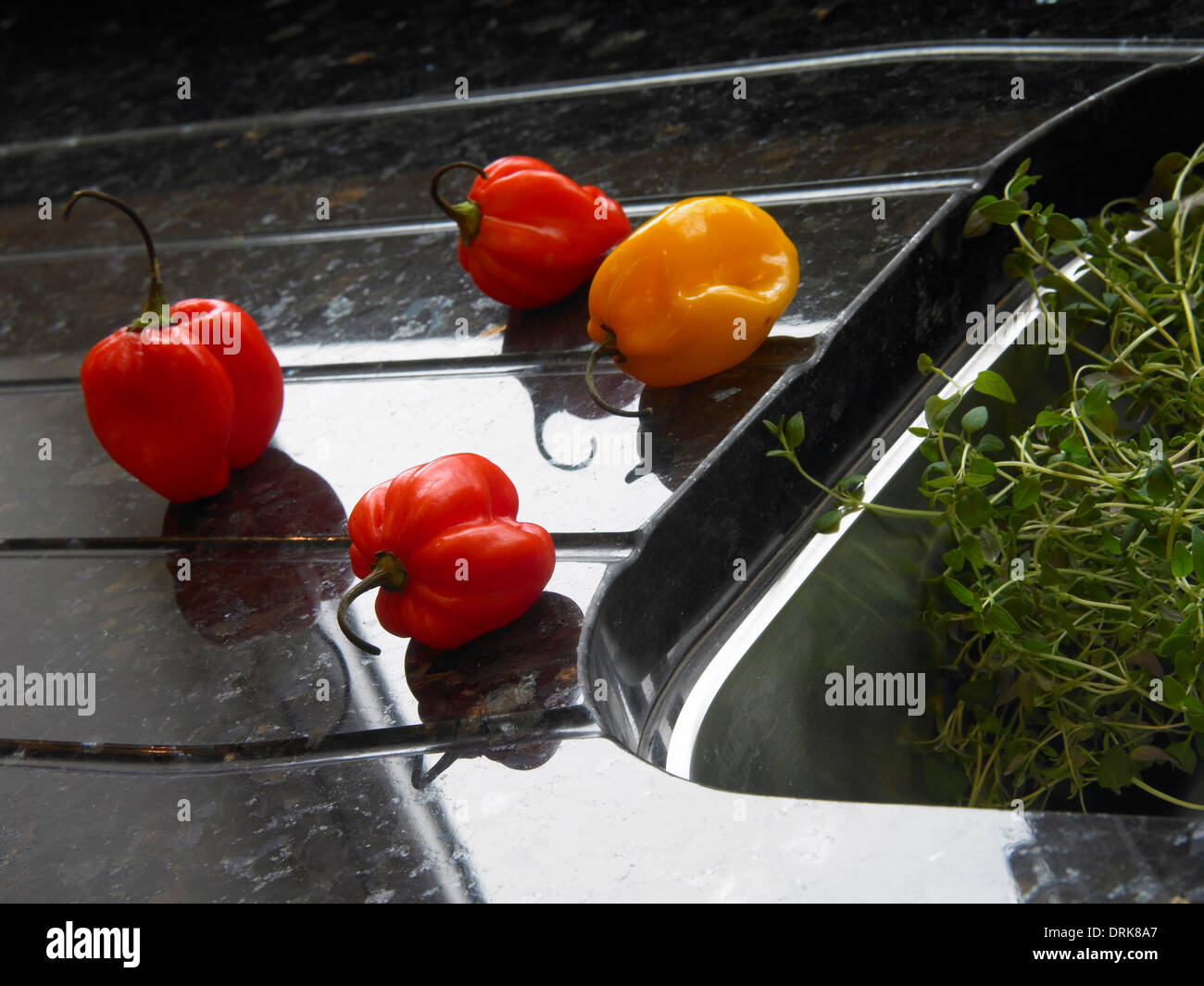Food preparation at the kitchen sink Stock Photo - Alamy