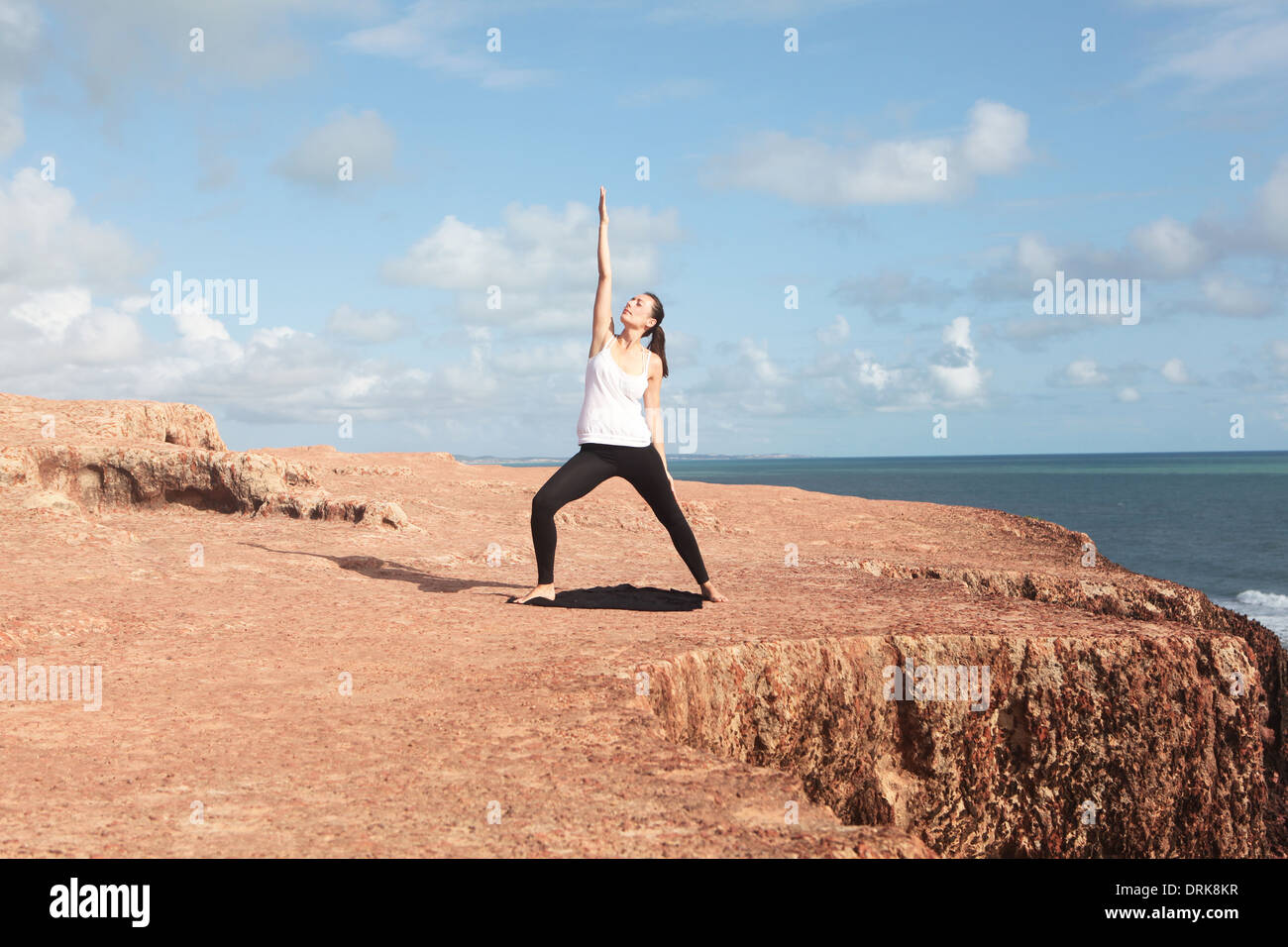 yoga exercise on a cliff Stock Photo - Alamy