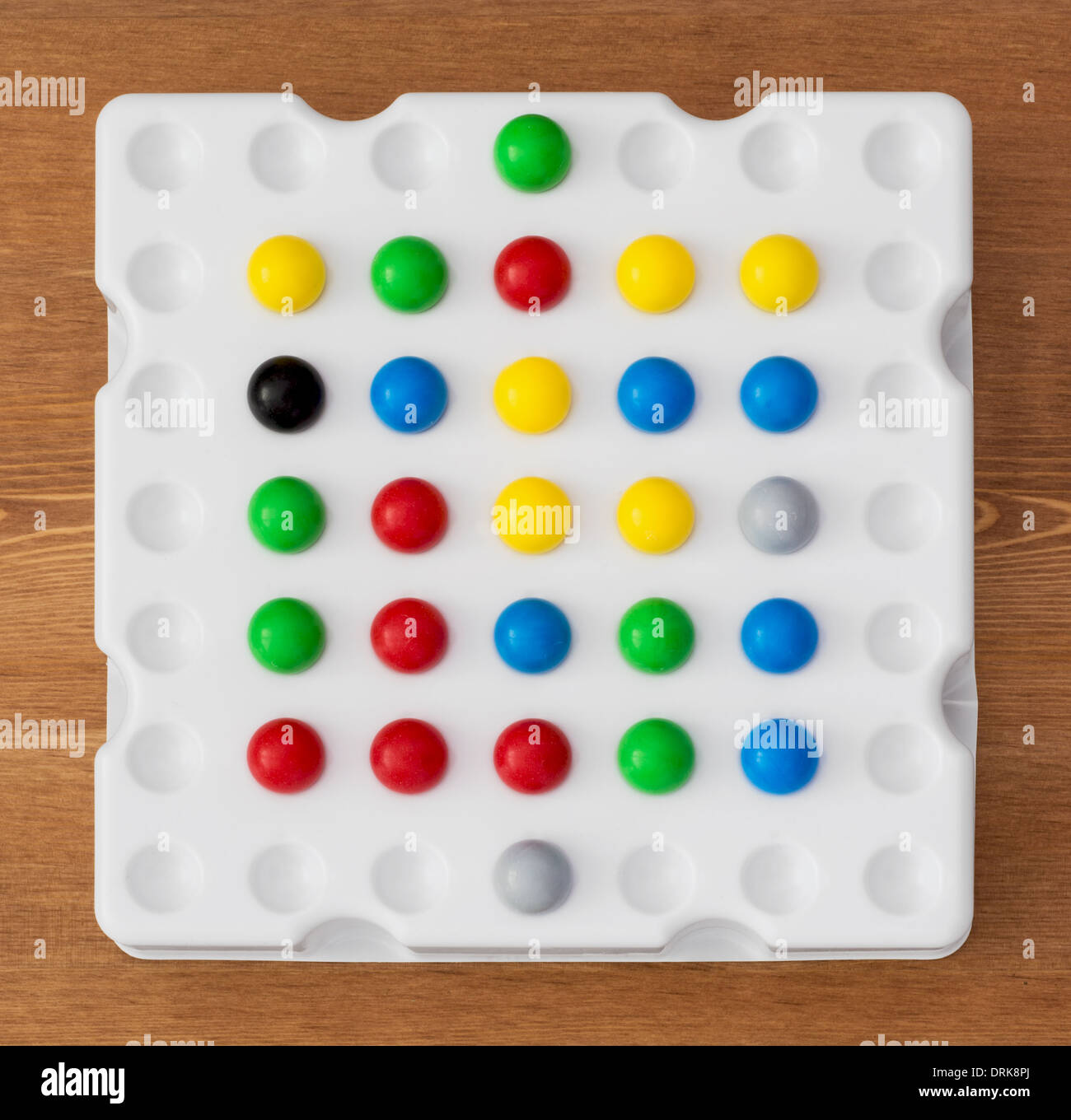 Logic board game with colorful balls Stock Photo - Alamy