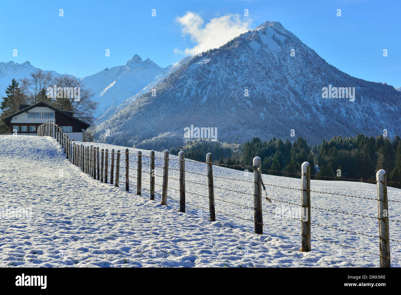 Winter scene of the foothills to the Bavarian Alps above the skiing and ...