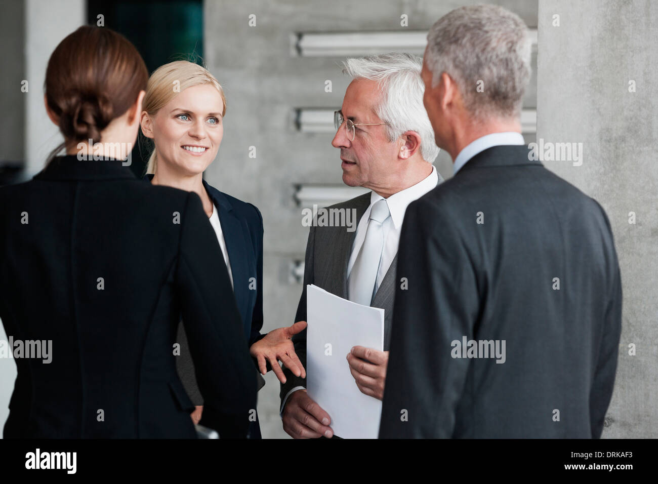 Four talking hi-res stock photography and images - Alamy
