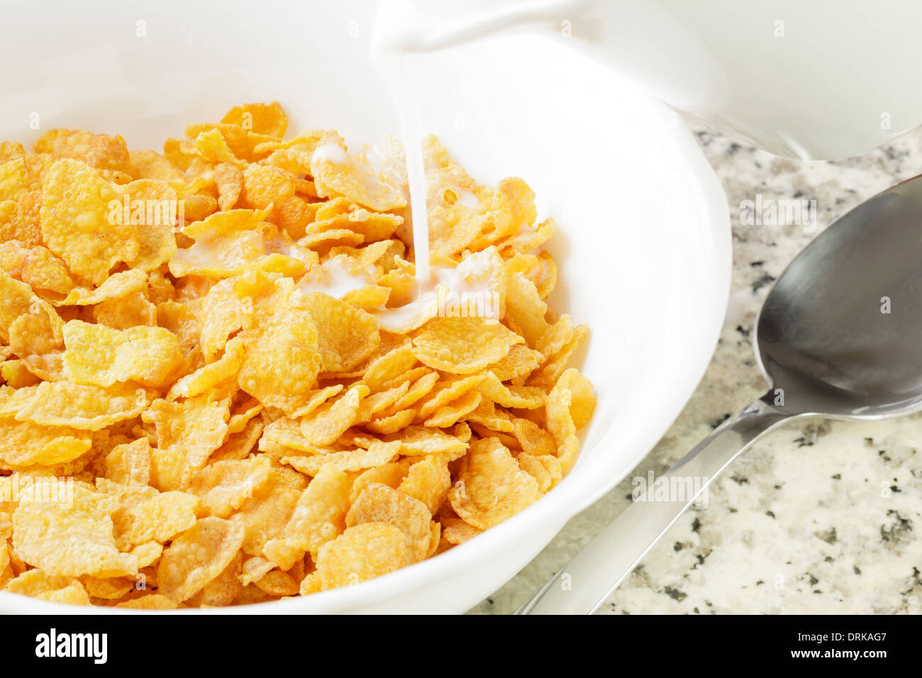 Pouring cornflakes hi-res stock photography and images - Alamy