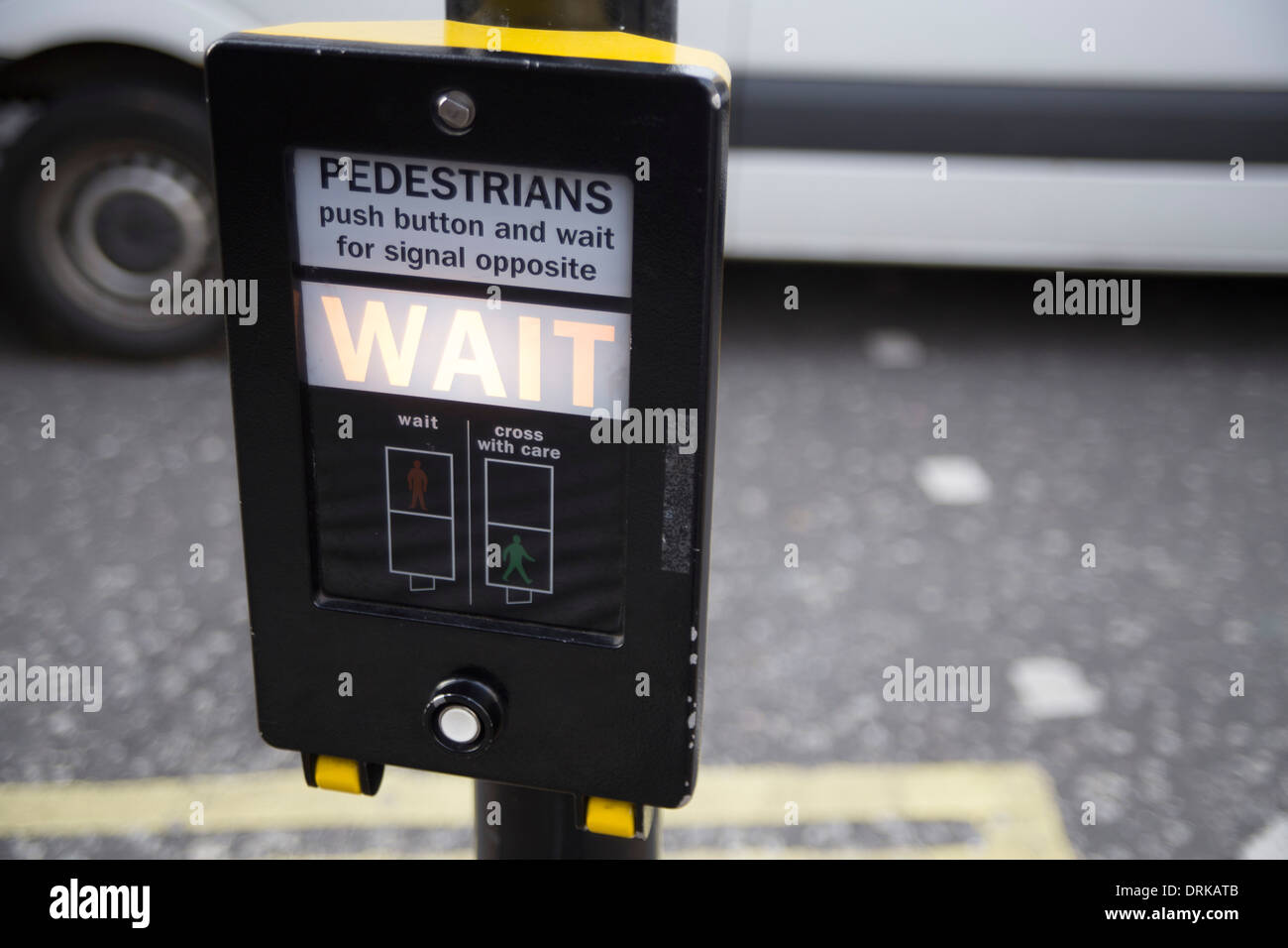 Illuminated wait sign at pedestrian crossing, London Stock Photo - Alamy