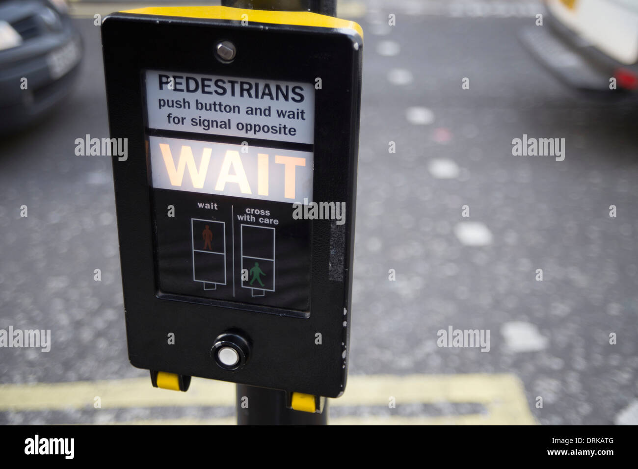 Illuminated wait sign at pedestrian crossing, London Stock Photo - Alamy