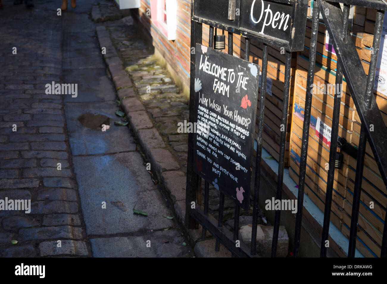 Hackney City Farm, open sign on gate Stock Photo - Alamy