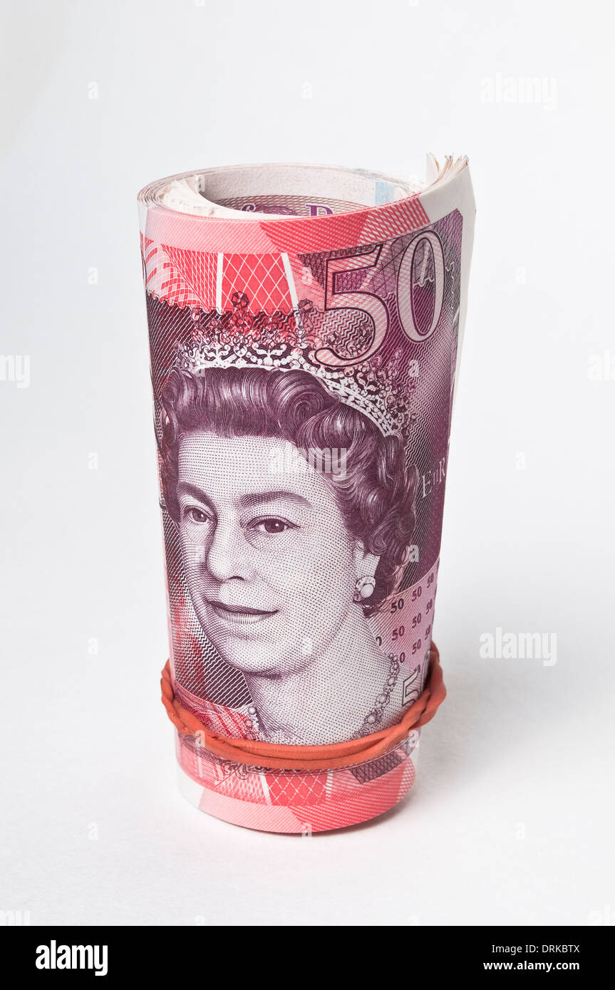 Roll of fifty pound banknotes Stock Photo - Alamy