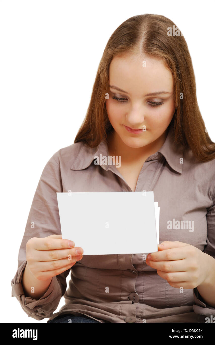 Teenage girl reading a card Stock Photo - Alamy