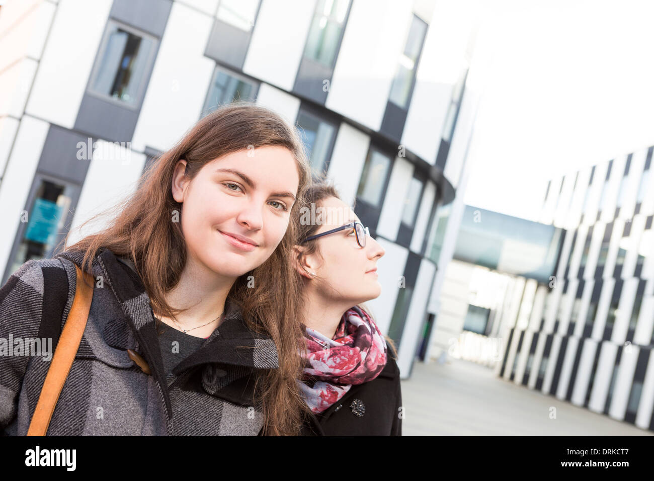 Two students outdoors, portrait Stock Photo - Alamy