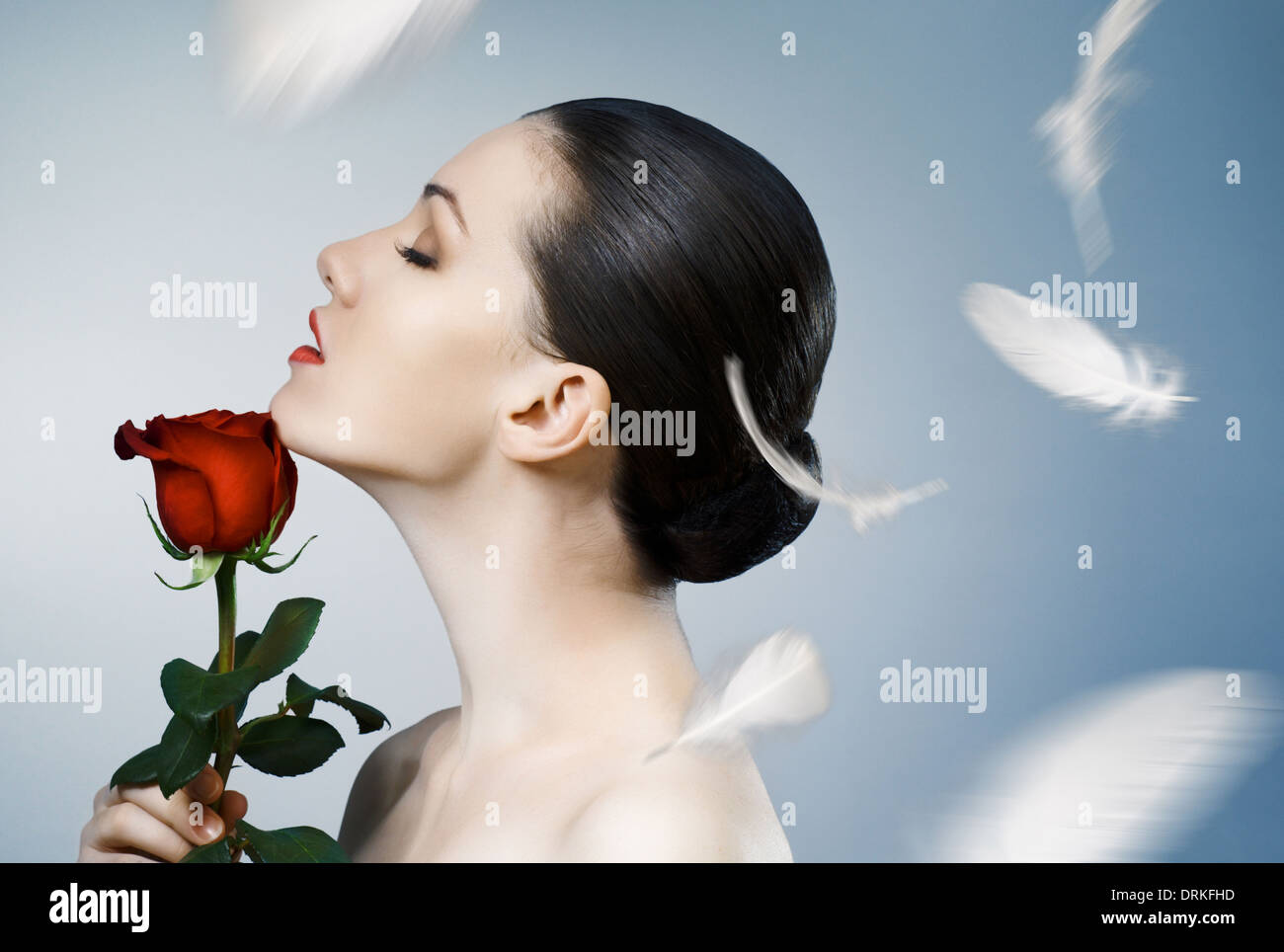 a beauty flower girl on the blue background Stock Photo - Alamy