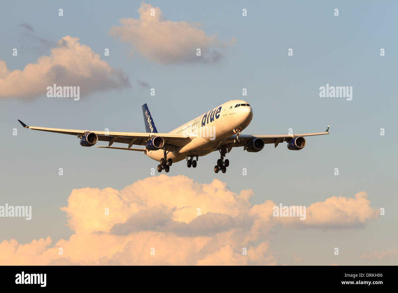 Airblue Airbus A340 plane to land Stock Photo - Alamy