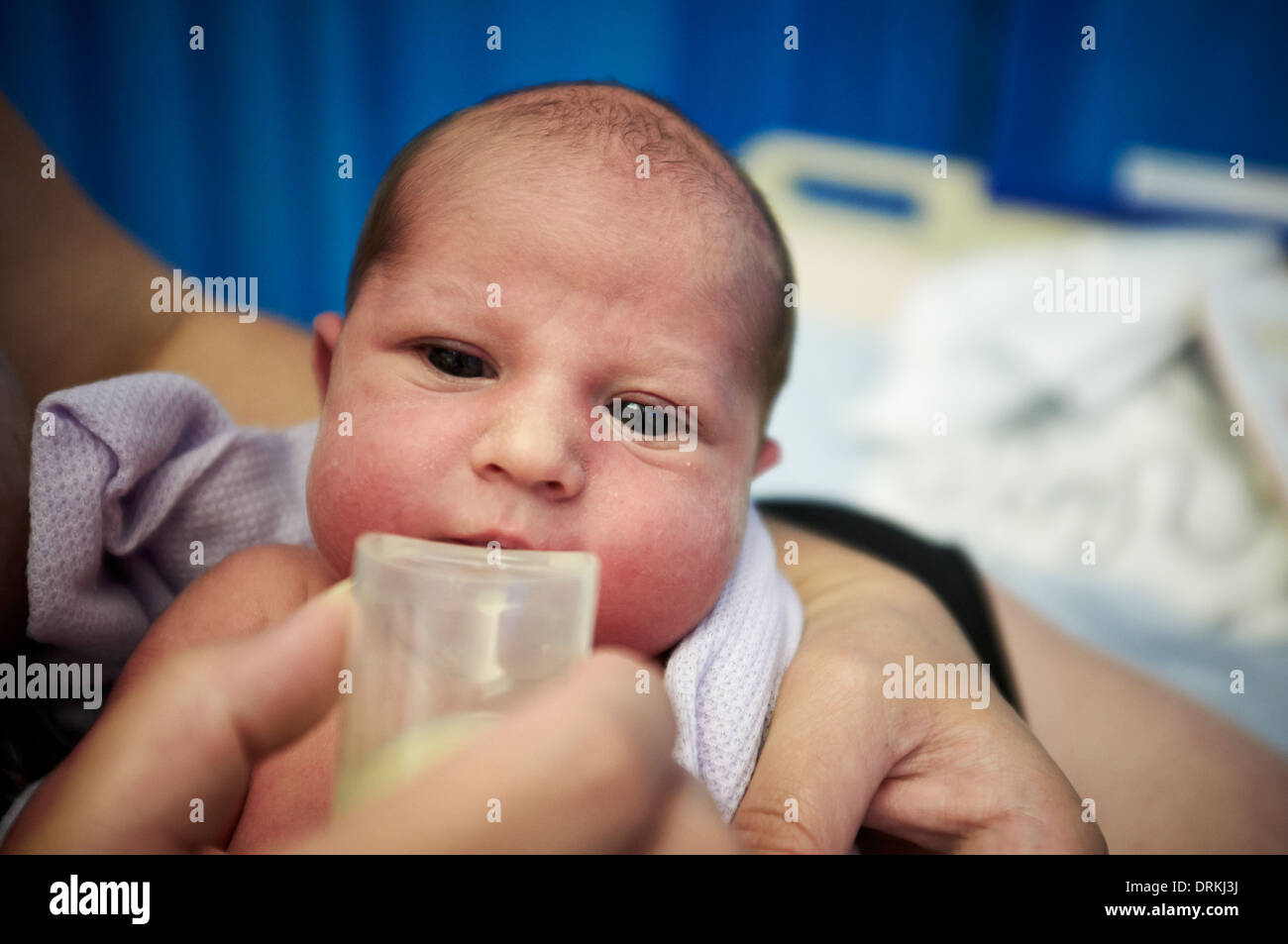 New born feed hi-res stock photography and images - Alamy