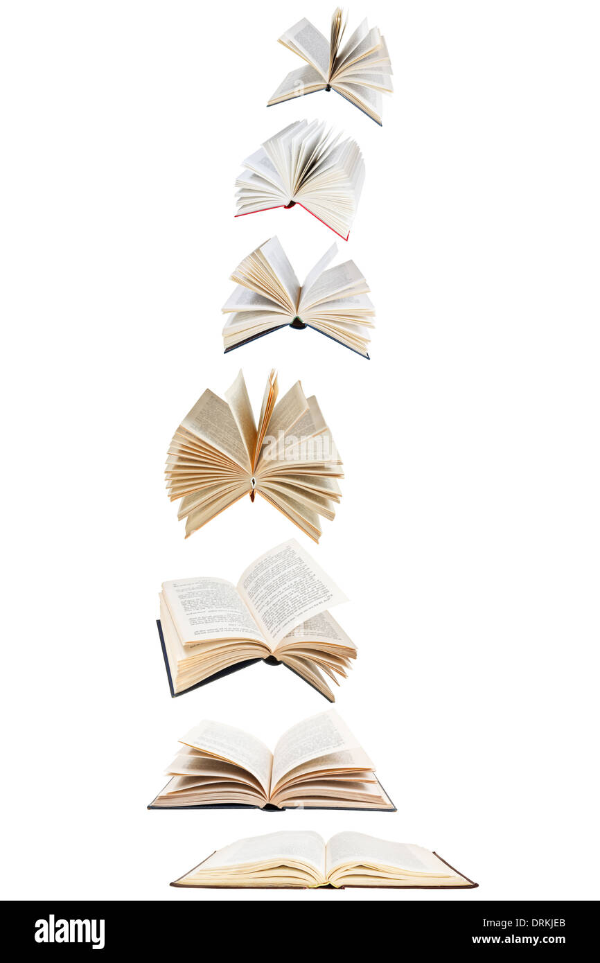 stack of flying books isolated on white background Stock Photo - Alamy