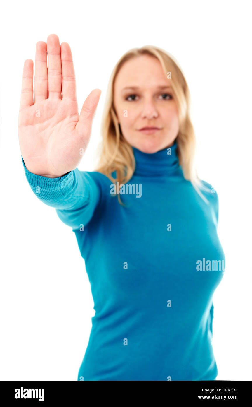 Confident woman stop gesture sing with hand Stock Photo - Alamy