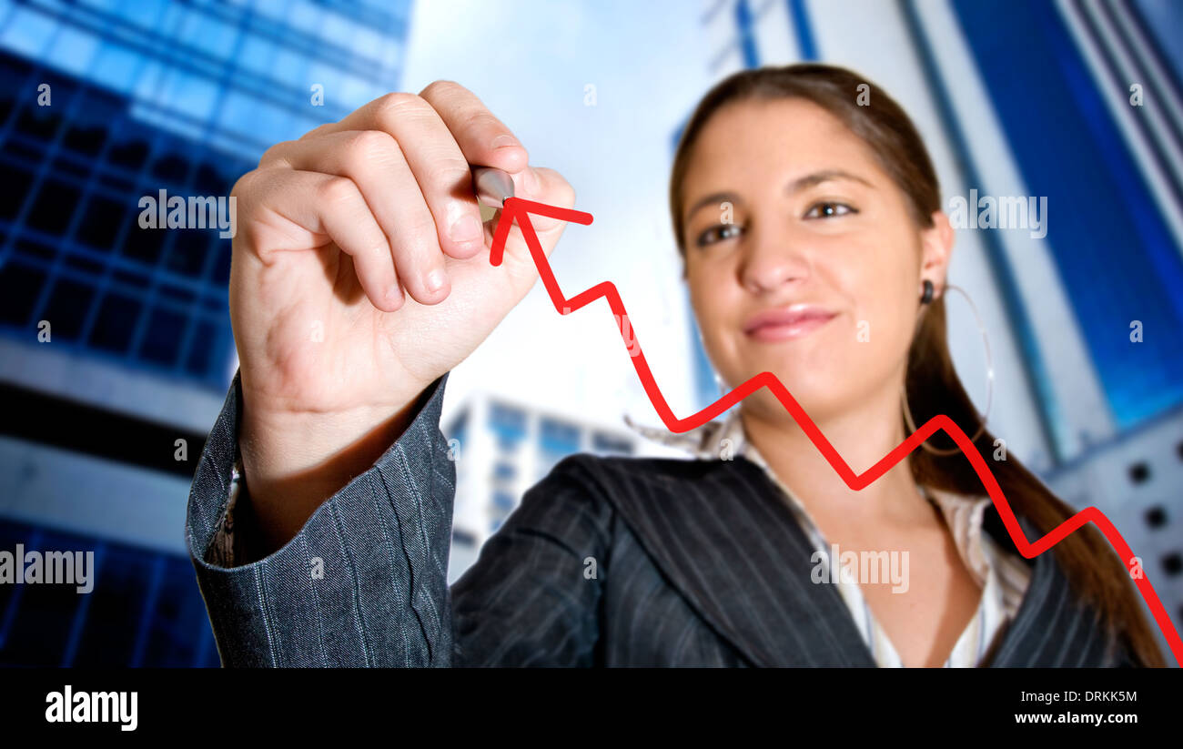 Business woman drawing a graph in the city Stock Photo - Alamy