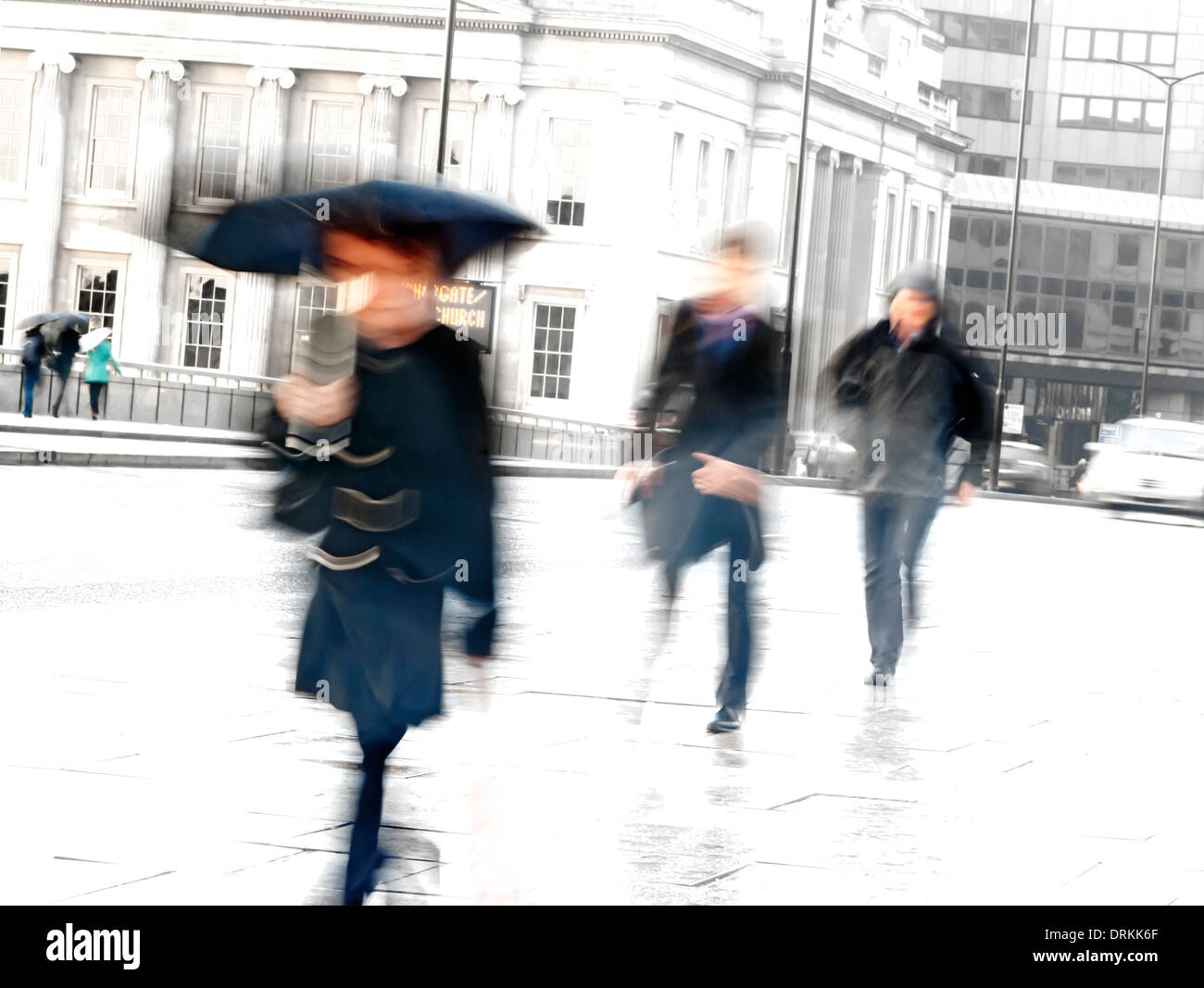 Commuters in the rain Stock Photo - Alamy