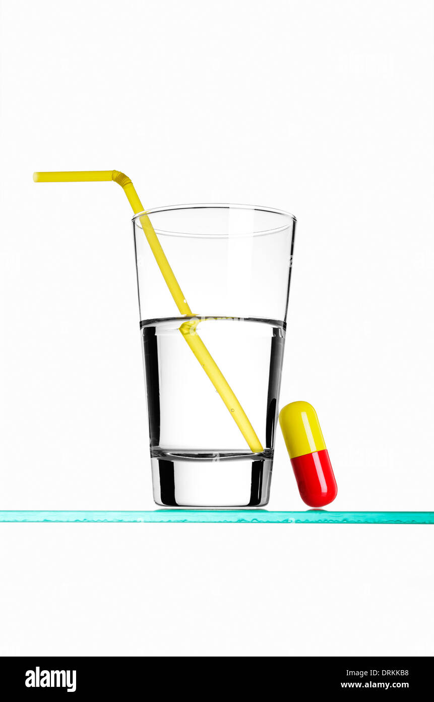 Pill and a glass hi-res stock photography and images - Alamy