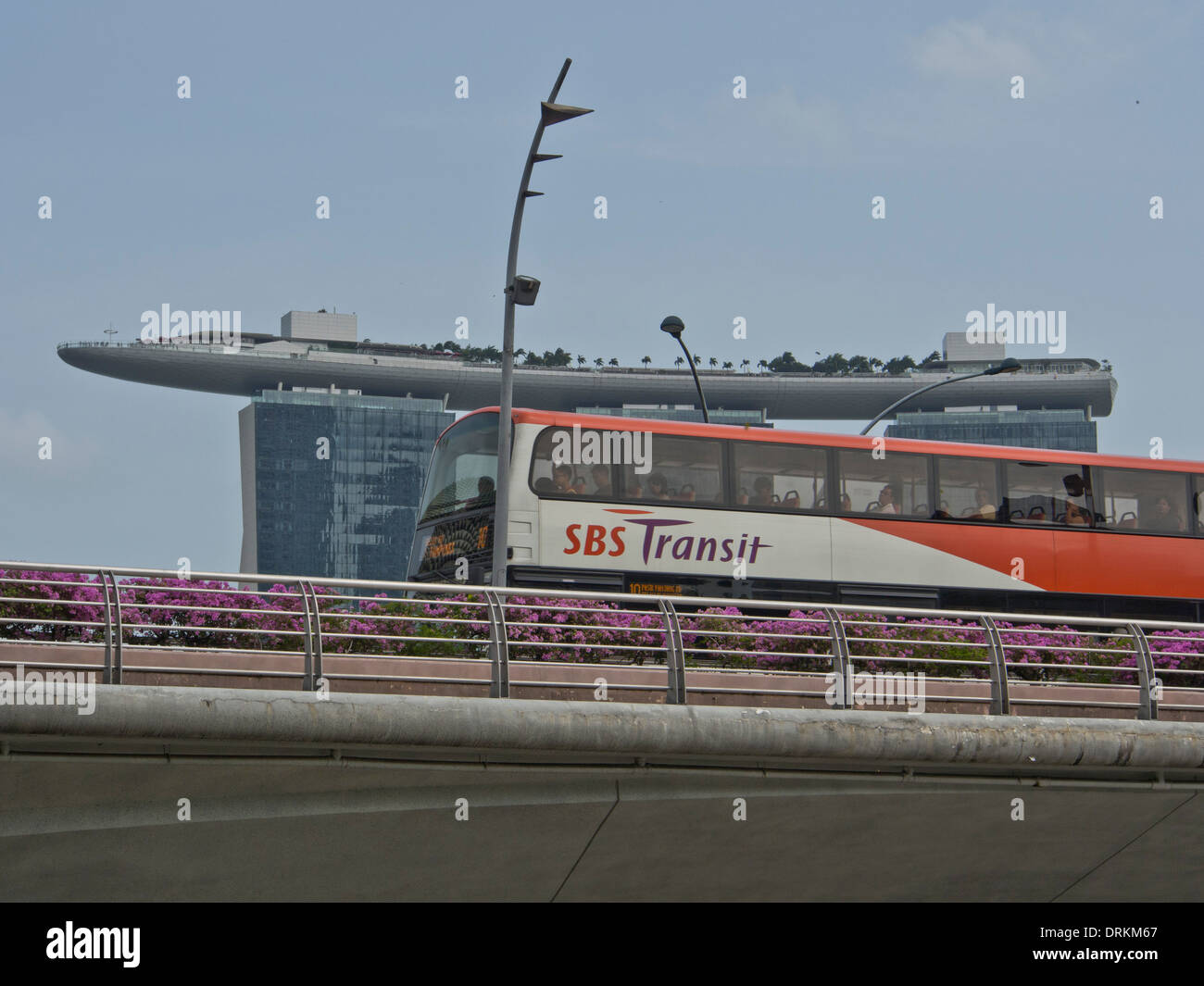 SBS bus with SkyPark building in background in Singapore Stock Photo ...