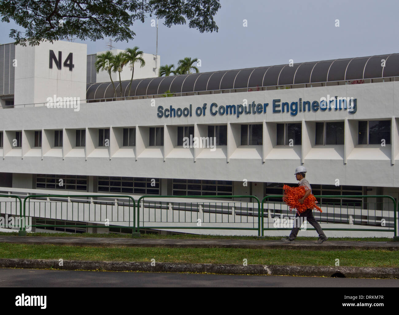 Building worker at the campus of Nanyang Technical University (NTU) in ...