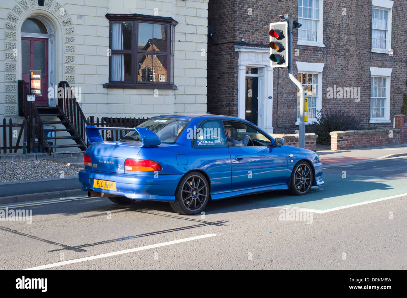 Man driving car sat waiting at traffic lights Stock Photo - Alamy